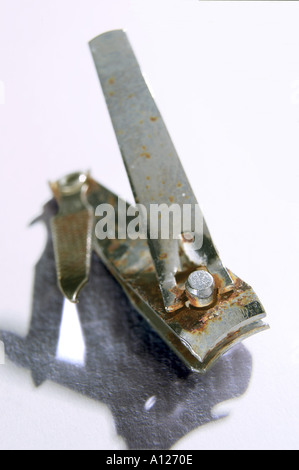 Old and rusty nail clippers Stock Photo - Alamy