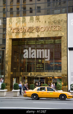 Yellow cab glass front skyscraper Manhattan New York City USA Stock ...