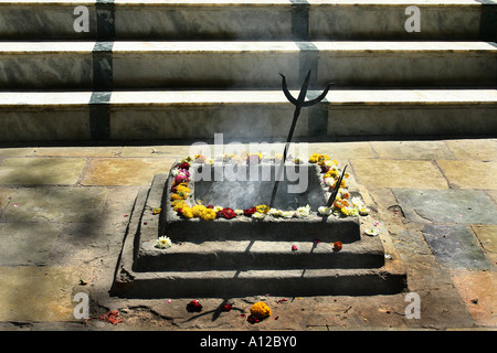 A Holy fire place also called Havan Kund with burnt ash in the middle ...
