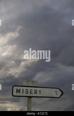 "Misery sign, stormy sky Stock Photo - Alamy