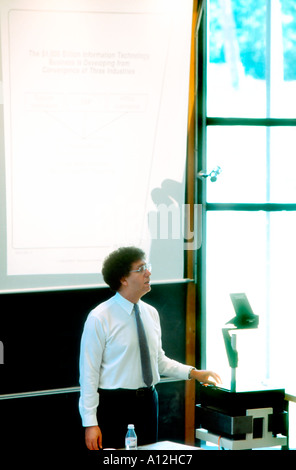 Professor giving presentation in lecture hall at university Stock Photo ...