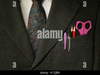 Mens suit jacket with pens and scissors in the top pocket Stock Photo ...