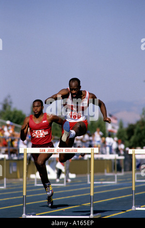 Edwin Moses track and field athlete, shows one of the gold medals he ...
