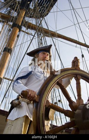 The Grand Turk's 'pirate guide' poses at helm of the 18th century mano ...