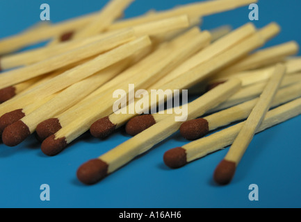 Pile of wooden matchsticks with brown heads isolated on white ...