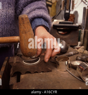 The tools of traditional silversmith working on jewellery Stock Photo ...