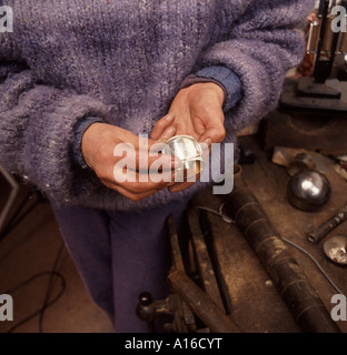 A traditional silversmith at work on jewellery Stock Photo - Alamy