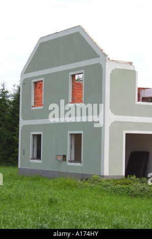 New build houses. Black roof, mountain Stock Photo - Alamy