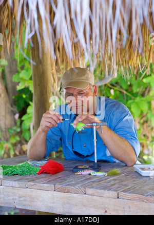 Man tying a fishing fly in Seattle, Washington, USA Stock Photo - Alamy