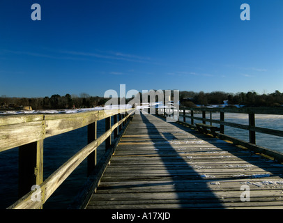 Long wooden wharf pier at Fort Foster which is an old Military base ...