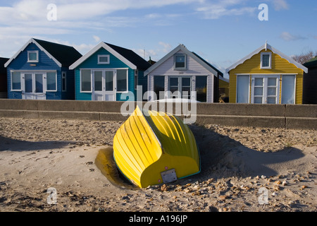 Beach Huts and upturned boat at Mudeford Spit, Christchurch Harbour ...