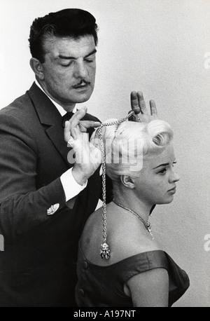 DIANA DORS UK film actress has her hair styled in 1956 by London ...