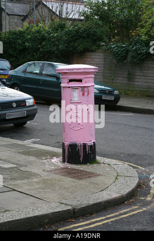 Vandalised pink postbox, West Hampstead, London England Stock Photo - Alamy
