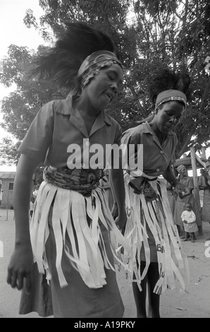 Women in grass skirts, performing Kastom (traditional culture) dancing ...
