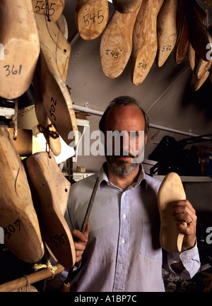 Making lasts for riding boots Stock Photo - Alamy