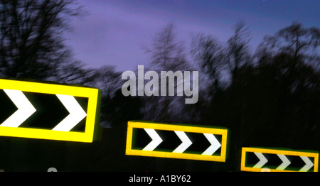 Chevron sharp right curve warning traffic sign arrows Stock Photo - Alamy