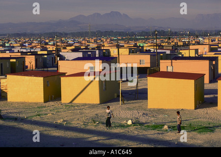 Delft Cape Town South Africa An african lady stands outside her home ...