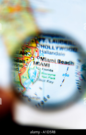 World map under magnifying glass, exploring new destinations. Travel ...