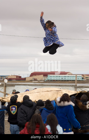 blanket toss at the spring Nilugatuk event celebrating the end of a ...