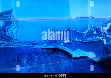 Abstract of a yacht marina reflected and distored in glass windows ...