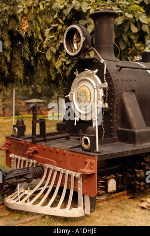 View of the front of an old steam, black locomotive with red star and ...