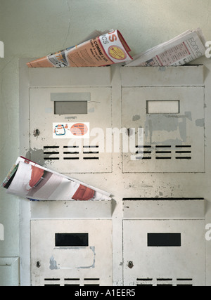 Close-up of mailbox slot and junk mail Stock Photo - Alamy
