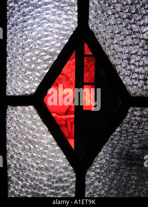 The diamond shaped pattern of a stained glass window UK Stock Photo - Alamy