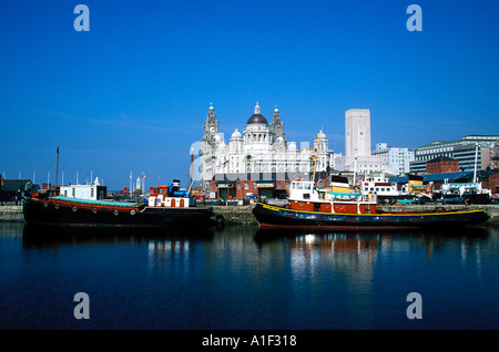 Preserved docks and vessels with Port of Liverpool and Liver Buildings ...