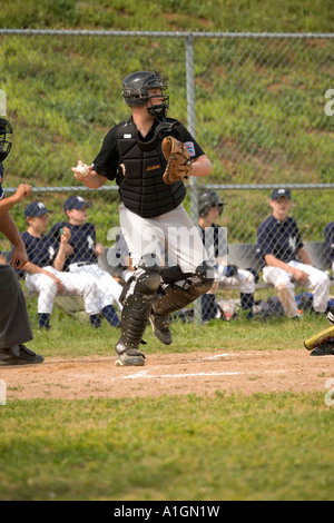 Boy preparing to throw baseball ball in rural field Stock Photo - Alamy