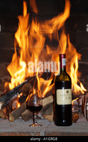 wood burning fire flames bottle wine alight Stock Photo - Alamy