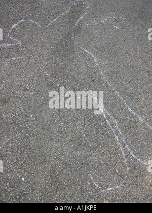 Outline of a body on asphalt Stock Photo - Alamy