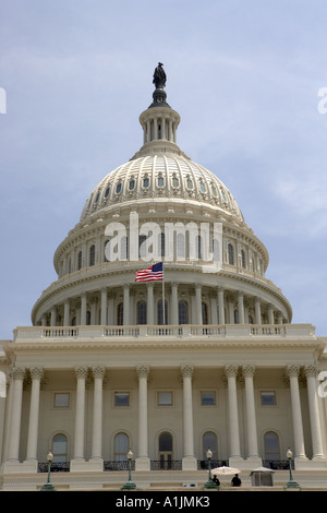 The American stars and stripes flag flys at the US Capitol Building ...