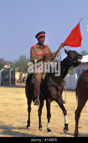 Member of paramilitary style group in uniform and on horseback for the ...