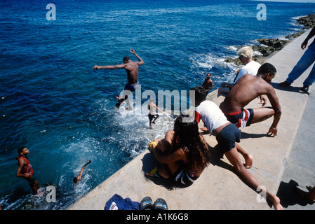 Cuban boys swimming at the Malecon Stock Photo: 4354757 - Alamy