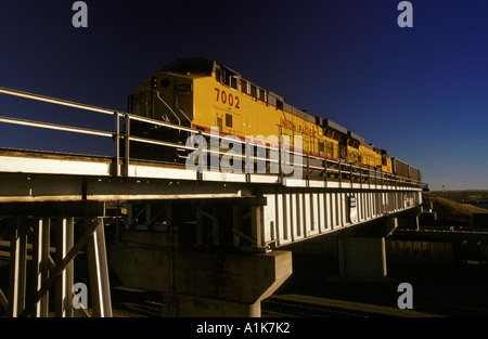 Union Pacific Railroad: Train crossing wooden trestle bridge near ...