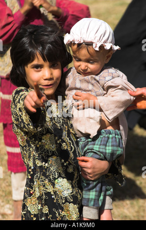 Children of the semi nomadic Aimaq people in front of summer yurts Pal ...