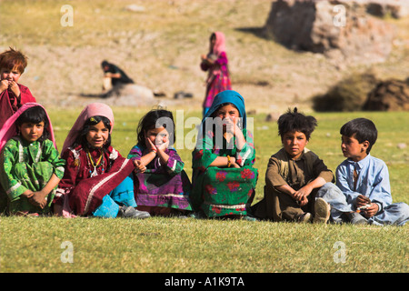 Children of the semi nomadic Aimaq people in front of summer yurts Pal ...
