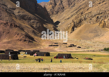 Children of the semi nomadic Aimaq people in front of summer yurts Pal ...