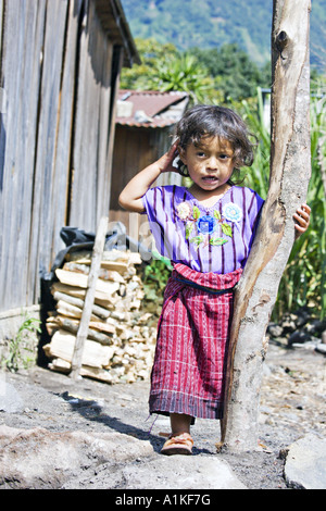 GUATEMALA PANABAJ Young Tzutujil girl in traditional dress of corte and ...