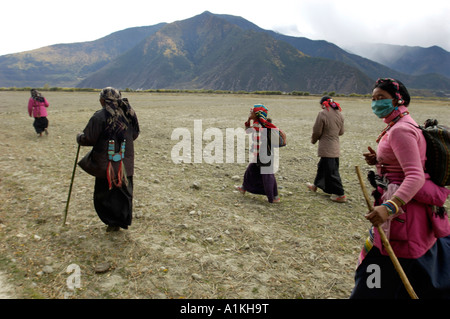 A group of Tibetan pilgrims in Nyingtri Tibet 24 OCT 2006 Stock Photo ...