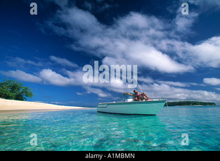 Tonga, Malinoa Island, Couple & Boat Stock Photo - Alamy