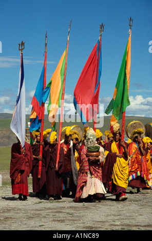 monks of the ancient Bon religion play a traditional role as they ...