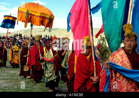 monks of the ancient Bon religion play a traditional role as they ...