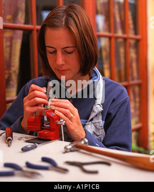 Young woman silversmith Stock Photo - Alamy