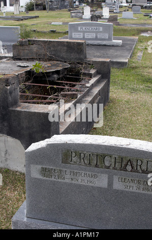 Above ground open crypt in graveyard Stock Photo - Alamy