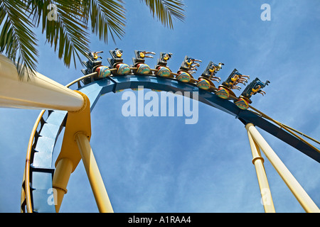 Riders hang suspended and loop up side down from the Montu roller ...