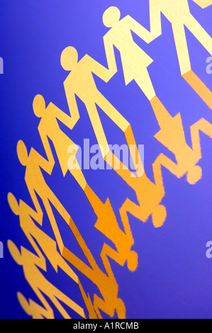 Team of paper chain people in a row holding hands Stock Photo - Alamy