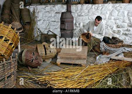 A traditional basket weaver demonstrating his craft at the Essex County ...