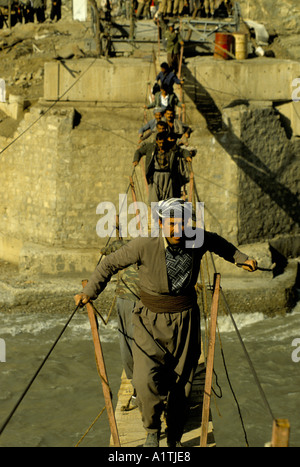 A bridge crossing a river in Iraq, with a clear view of the surrounding ...