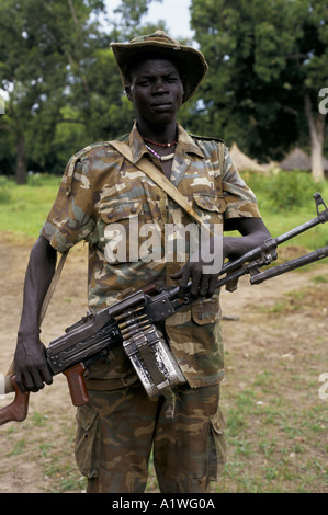 SPLA SOLDIER WEARING COMBAT UNIFORM CARRYING TRANSISTOR RADIO AK47 ...